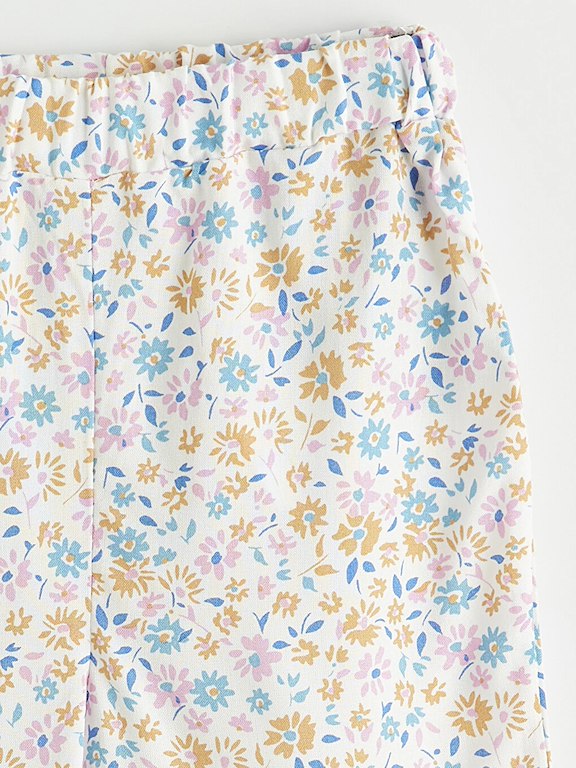 LC WAIKIKI Dečije Pantalone Sa Cvetnim Printom I Elastičnim Pojasom.