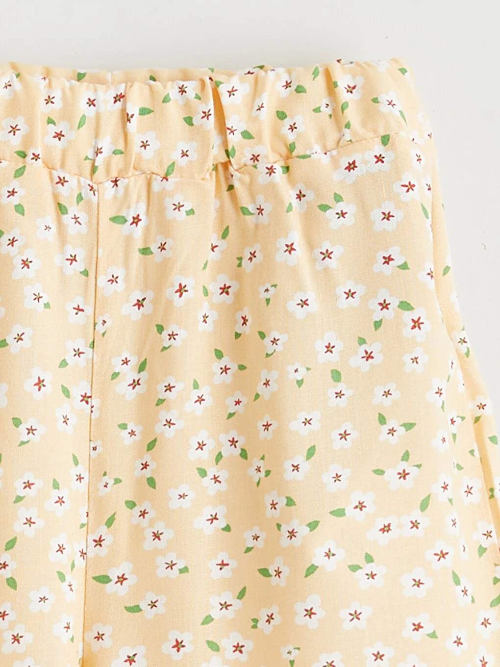 LC WAIKIKI Dečije Pantalone Sa Cvetnim Dezenom I Elastičnim Pojasom.