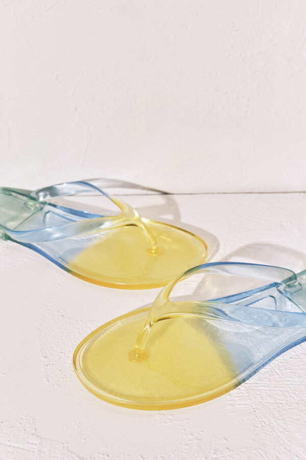 Grüne transparente Flip-Flops