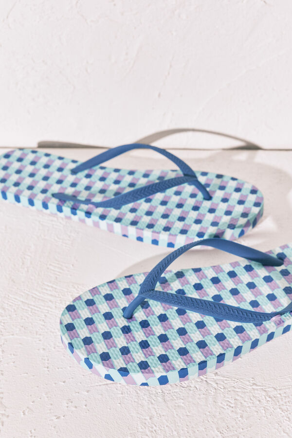 Blaue Zehensteg-Flip-Flops mit geometrischem Print