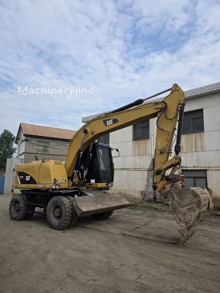 Caterpillar 315D2 bager točkaš