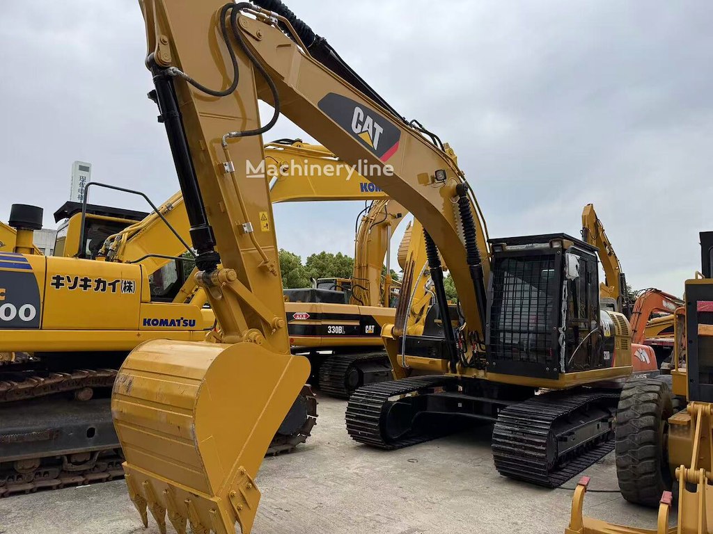 Caterpillar 320D bager guseničar