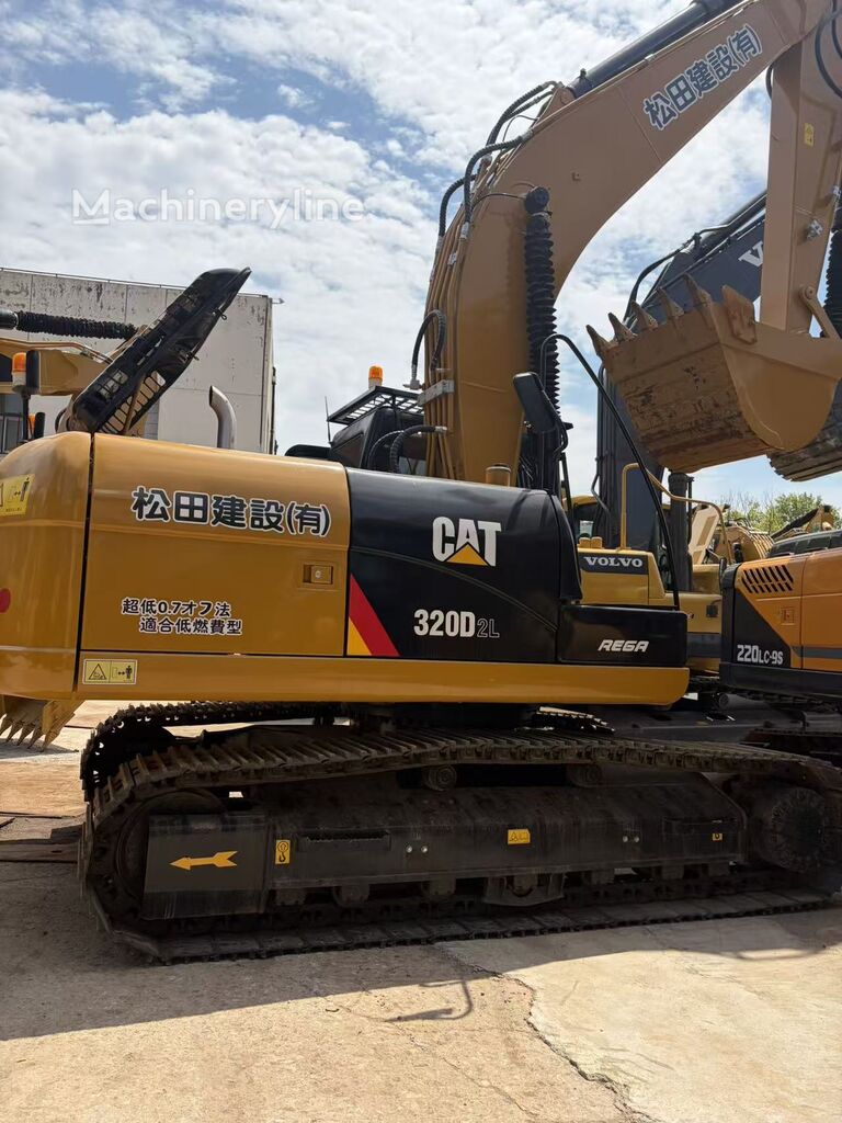 Caterpillar 320DL bager guseničar