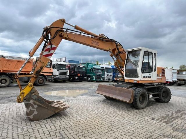 Točkaš bager
LIEBHERR A 312 Bagger Deutsch Top