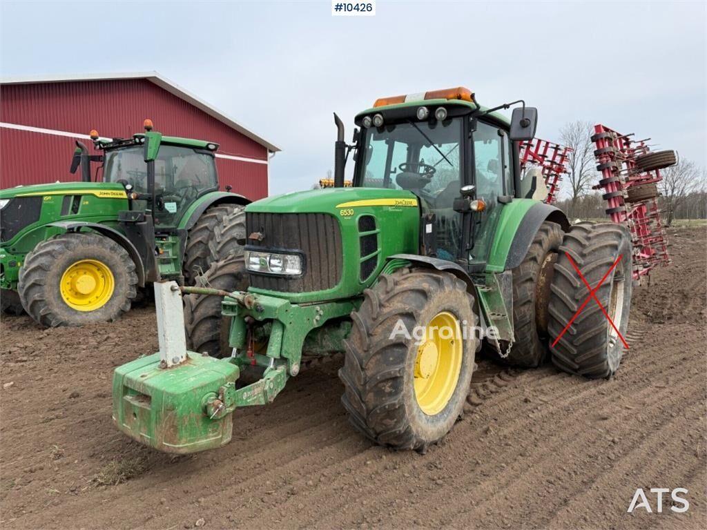 John Deere 6530 Premium with front loader and front lift traktor točkaš