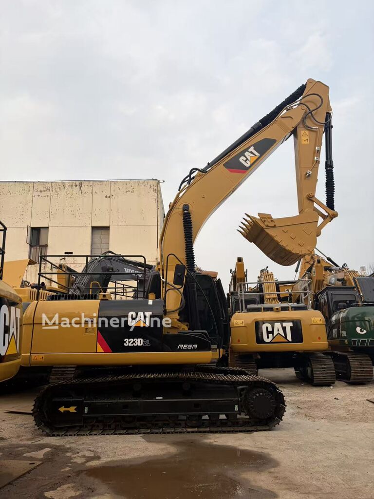 Caterpillar 323DL bager guseničar