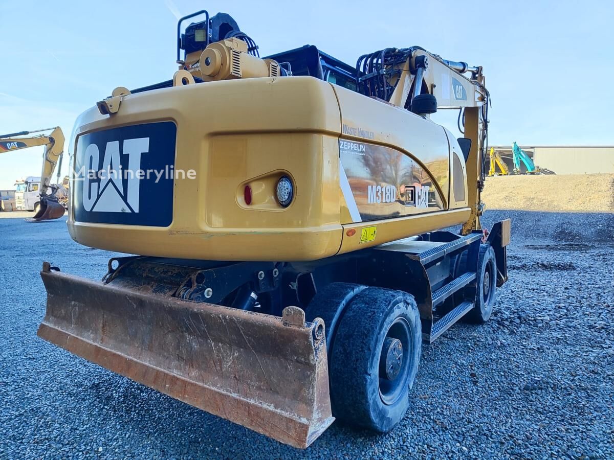 Caterpillar M318D MH bager za pretovar