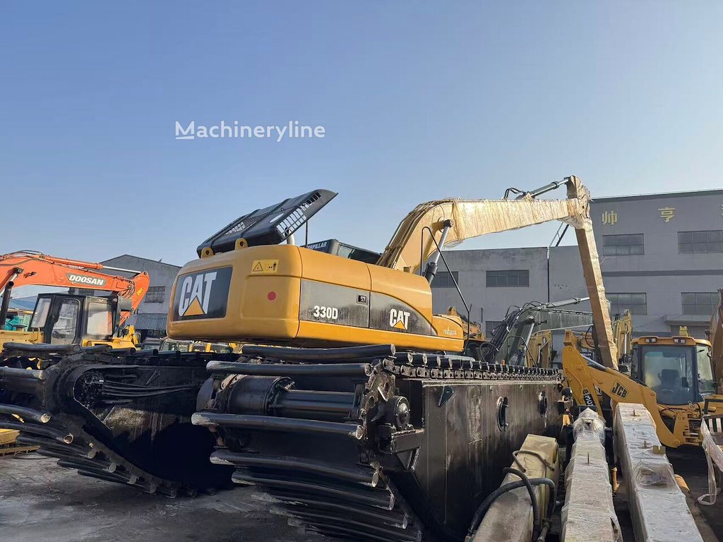 Caterpillar 330D bager amfibija