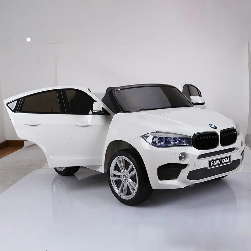 Eurobajk Automobil na akumulator za decu Dvosed BMW X6 M, Beli