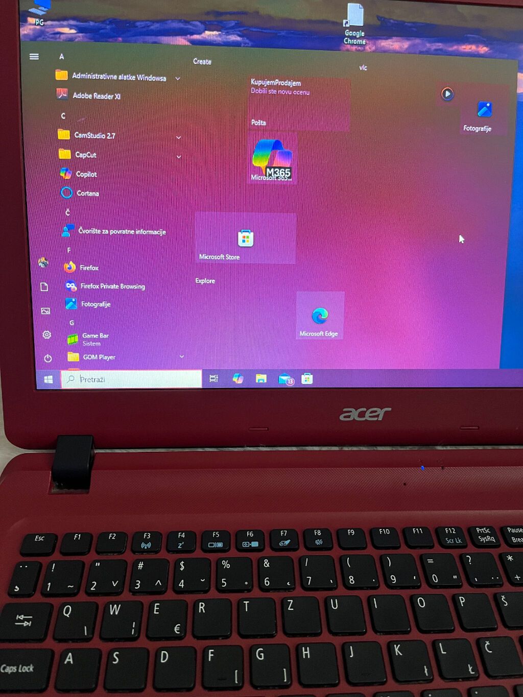 Acer mini laptop – 11.6" ekran, crveno kućište Specifikacije: -