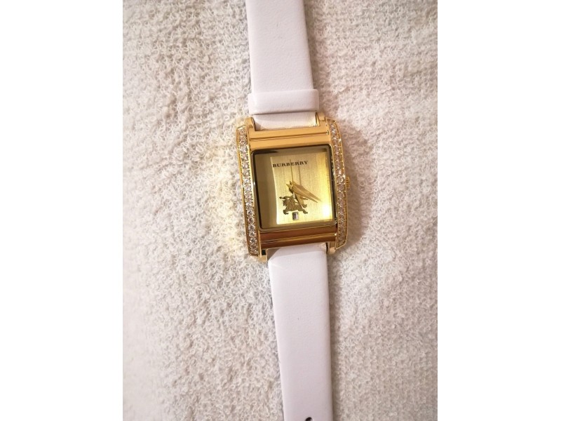 Odlican zenski rucni sat poznate marke Burberry Beli