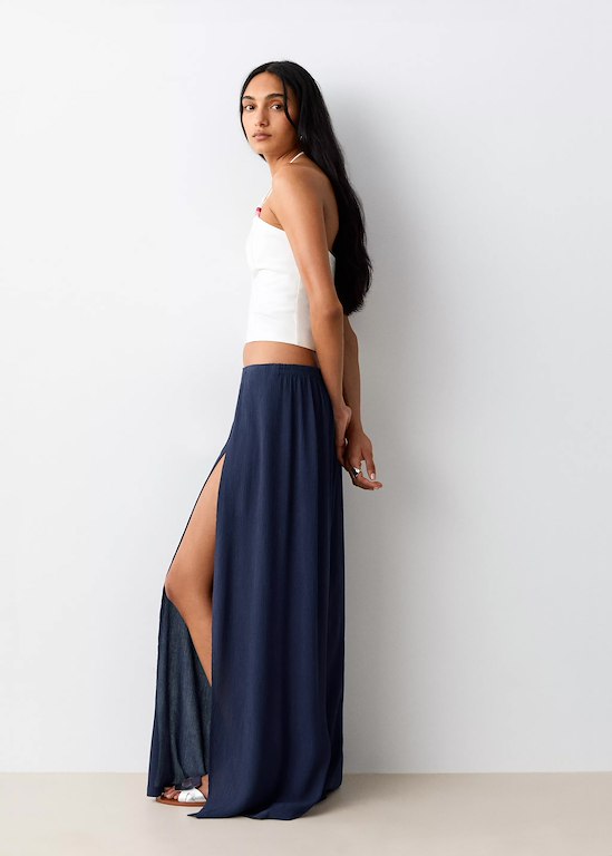 FLUID TROUSERS WITH SIDE OPENINGS