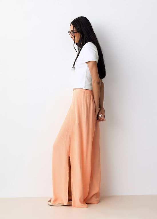 FLUID TROUSERS WITH SIDE OPENINGS
