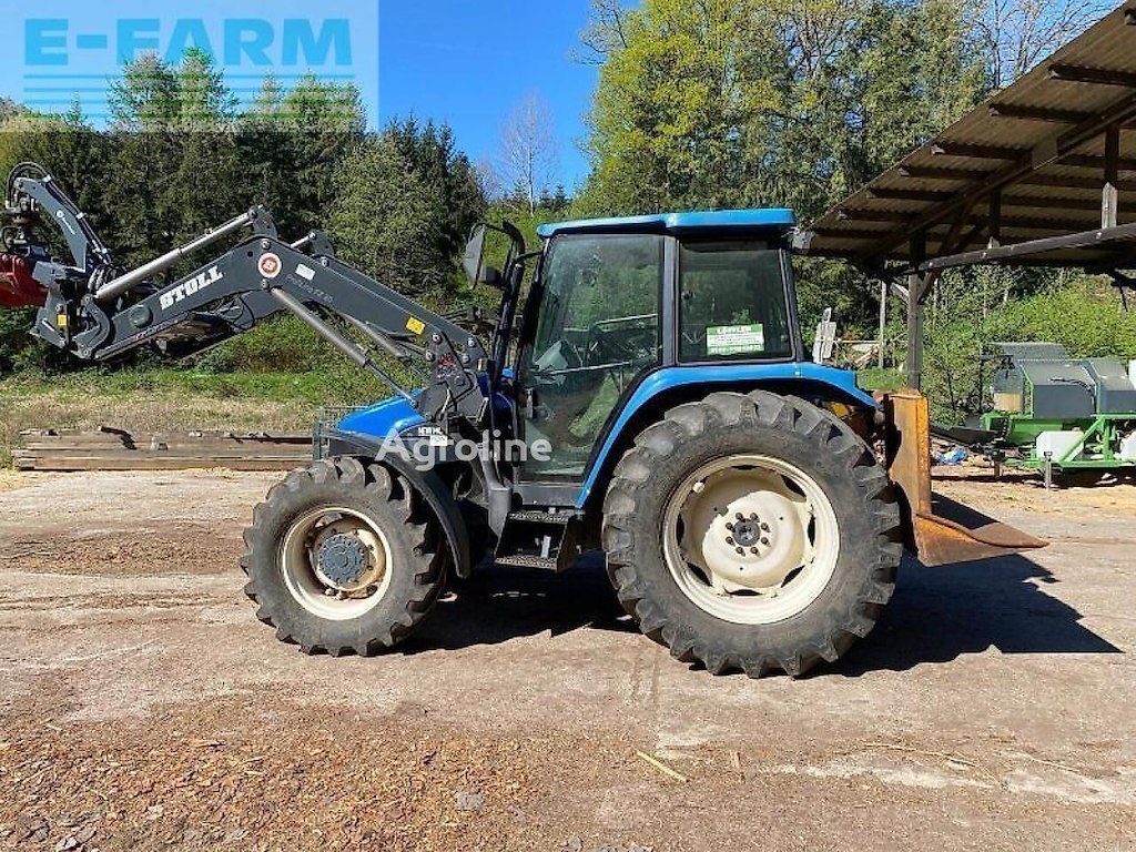New Holland tl 100 traktor točkaš