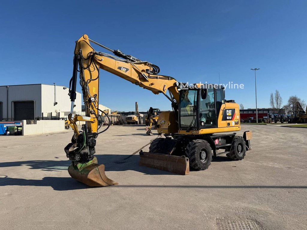 Caterpillar M315F bager točkaš