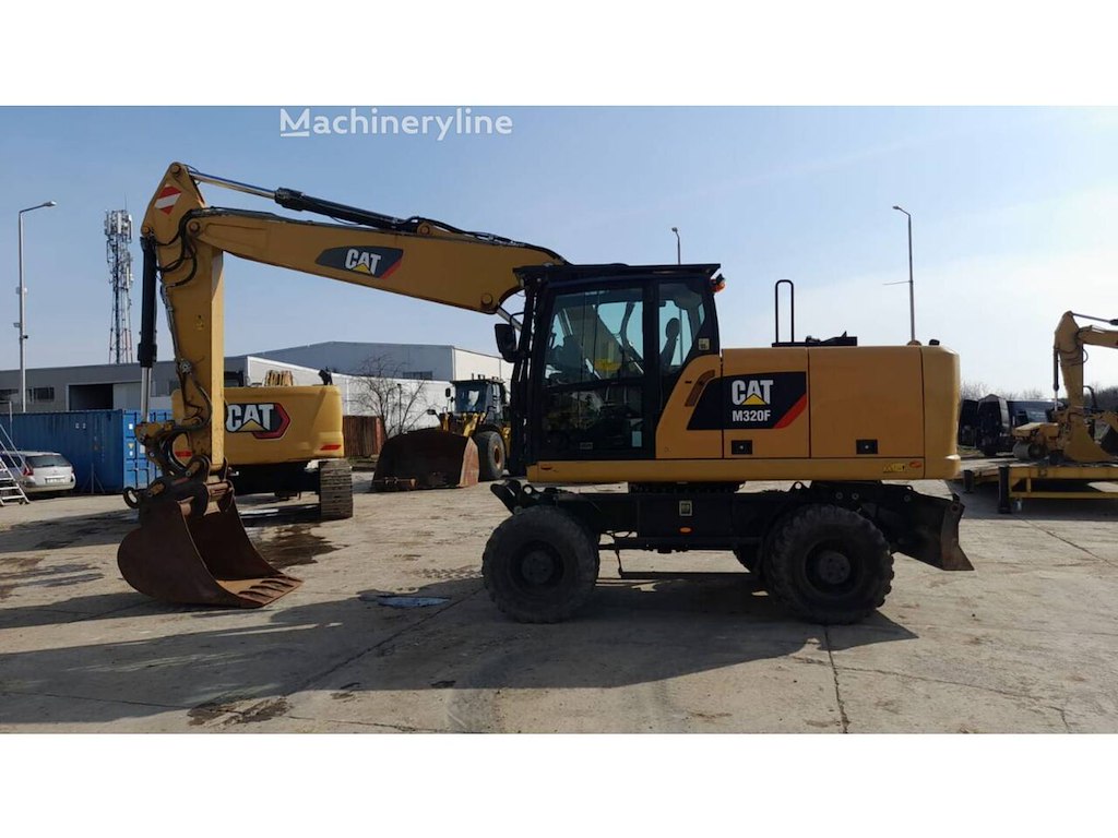 Caterpillar M320F bager točkaš