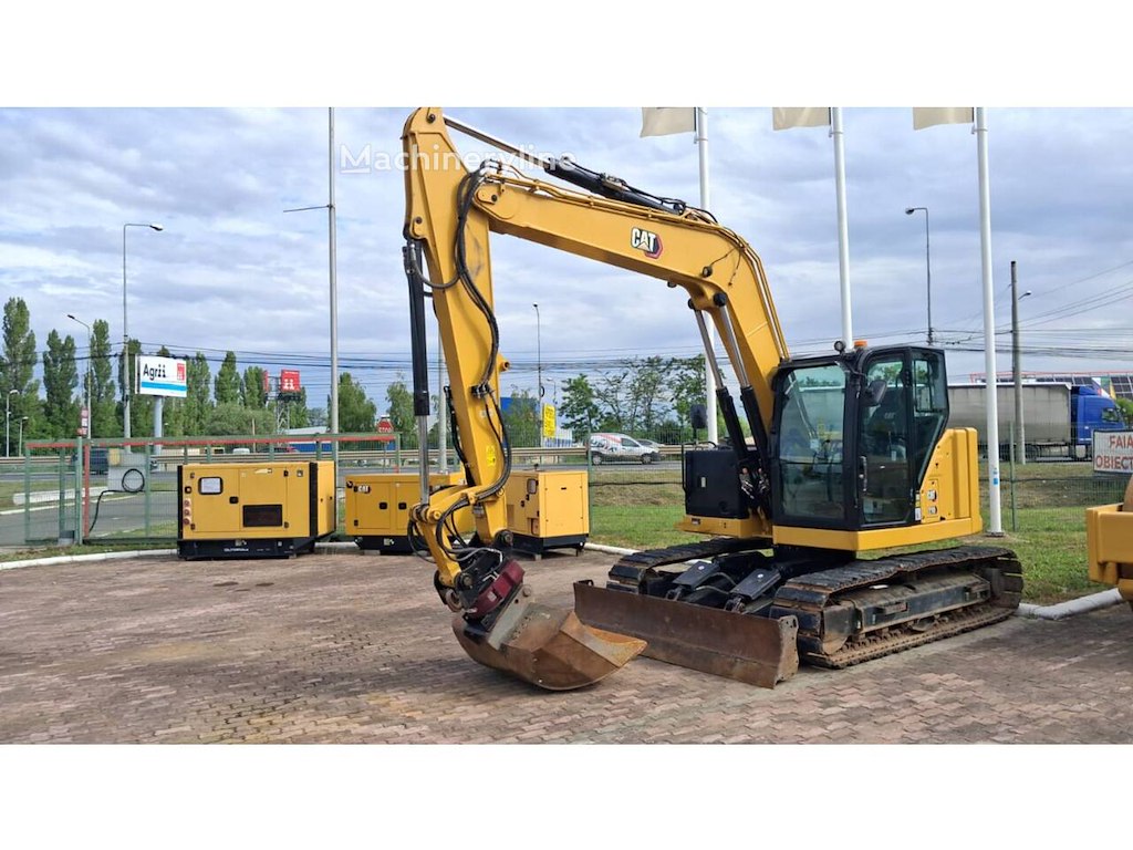 Caterpillar 310-07 bager guseničar