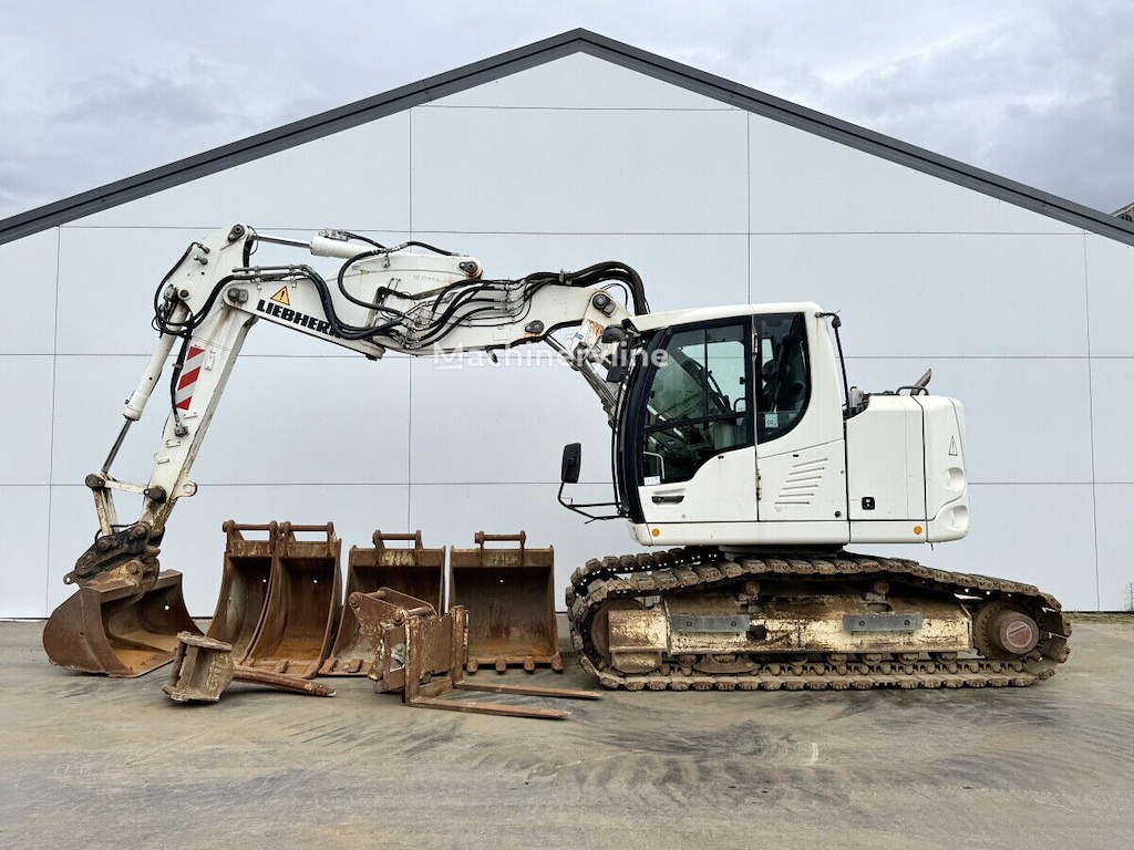 Liebherr R914 Compact bager guseničar