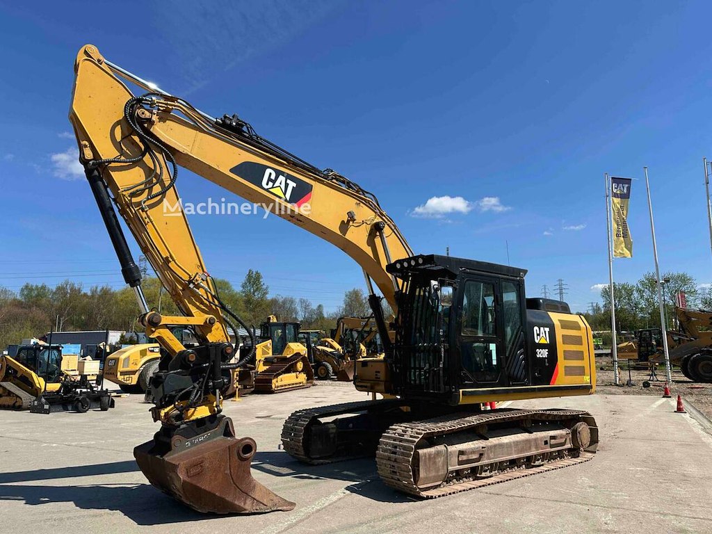 Caterpillar 320FL bager guseničar