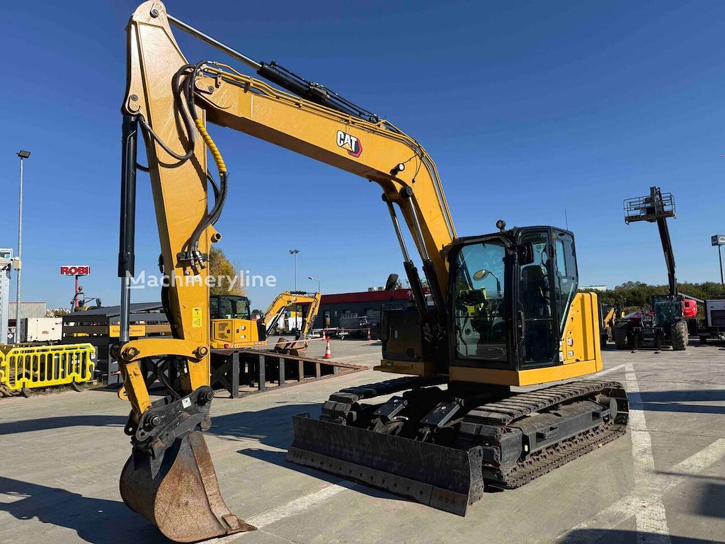 Caterpillar 310 bager guseničar