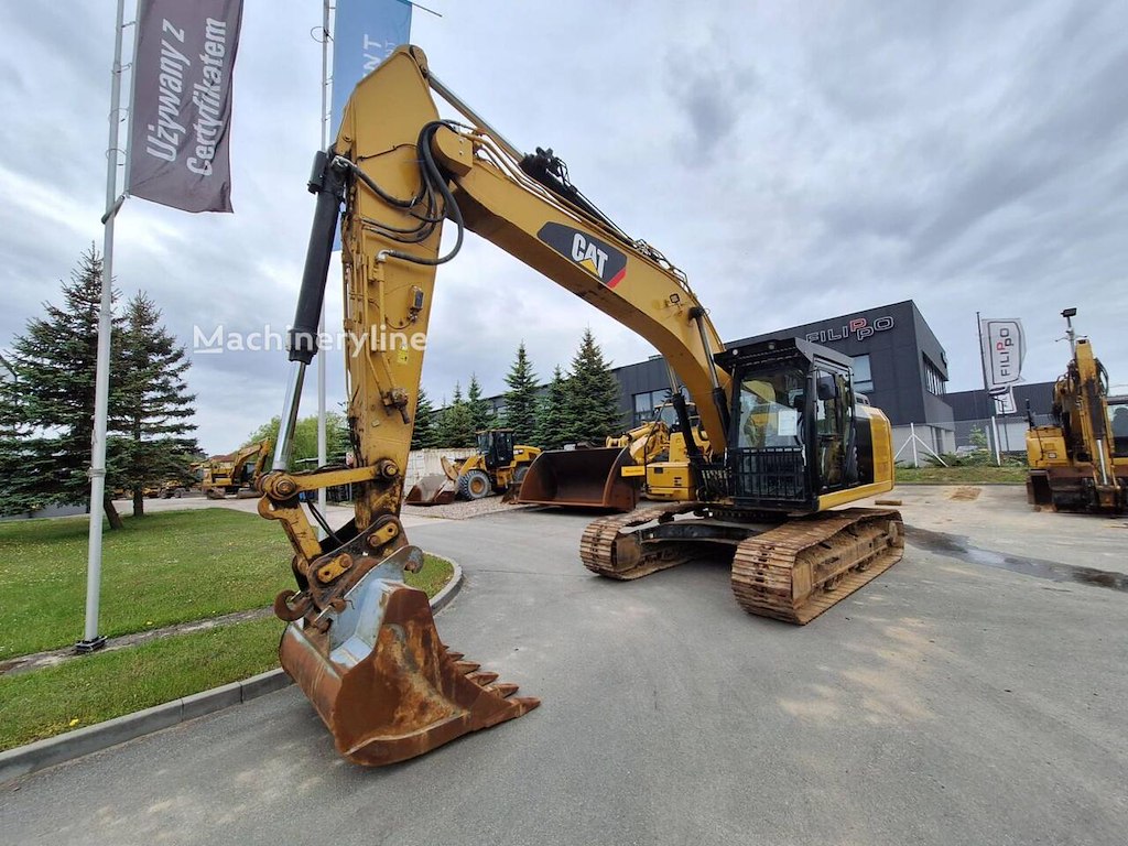 Caterpillar 323FL bager guseničar