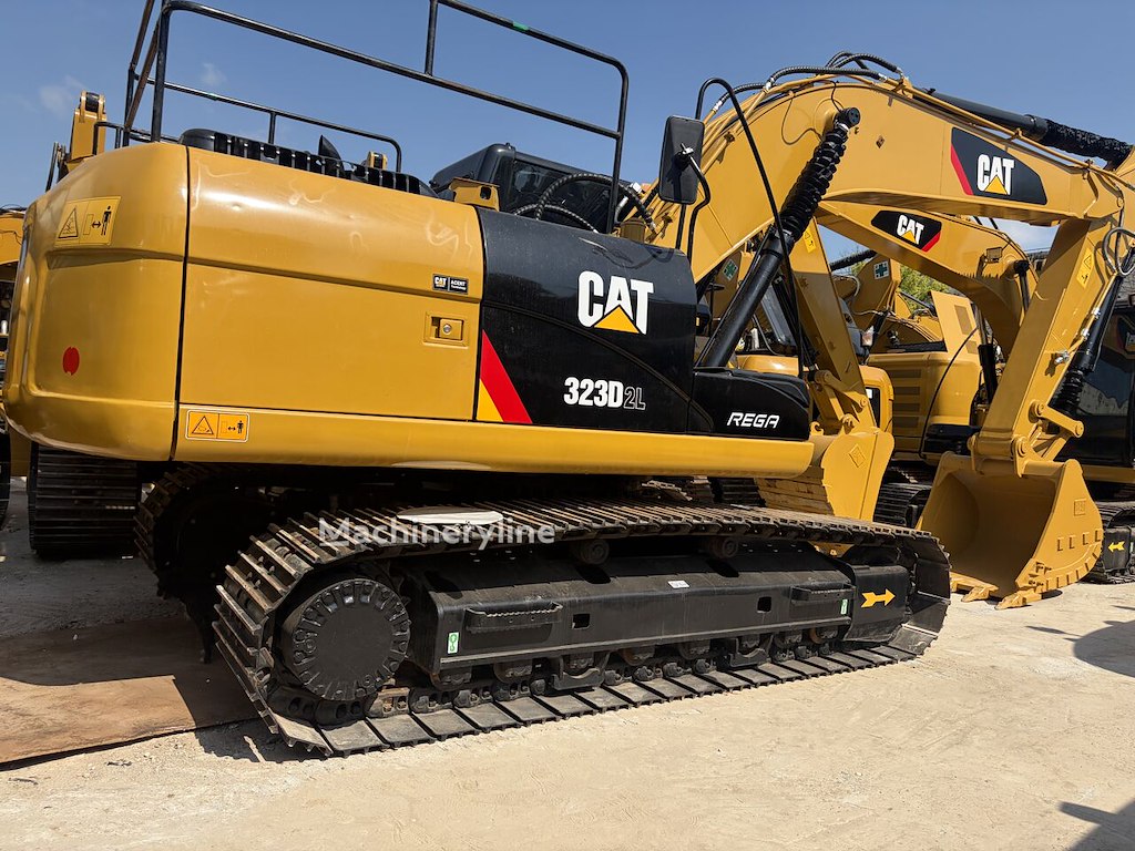 Caterpillar 323DL bager guseničar