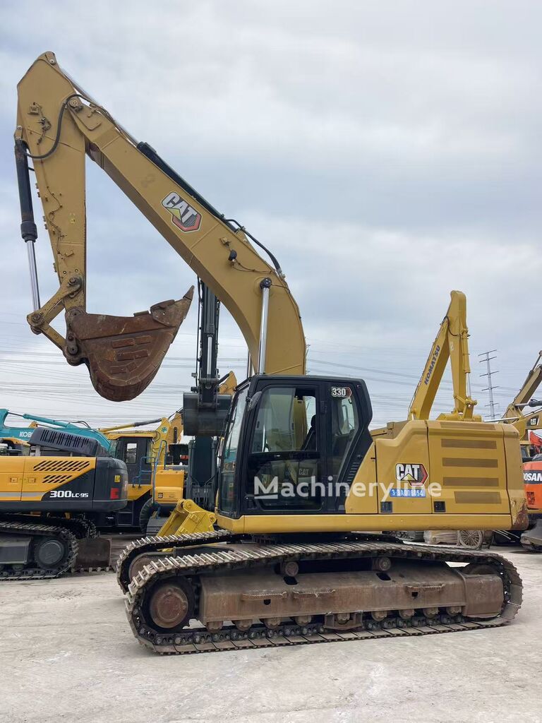 Novi Caterpillar 330 bager guseničar