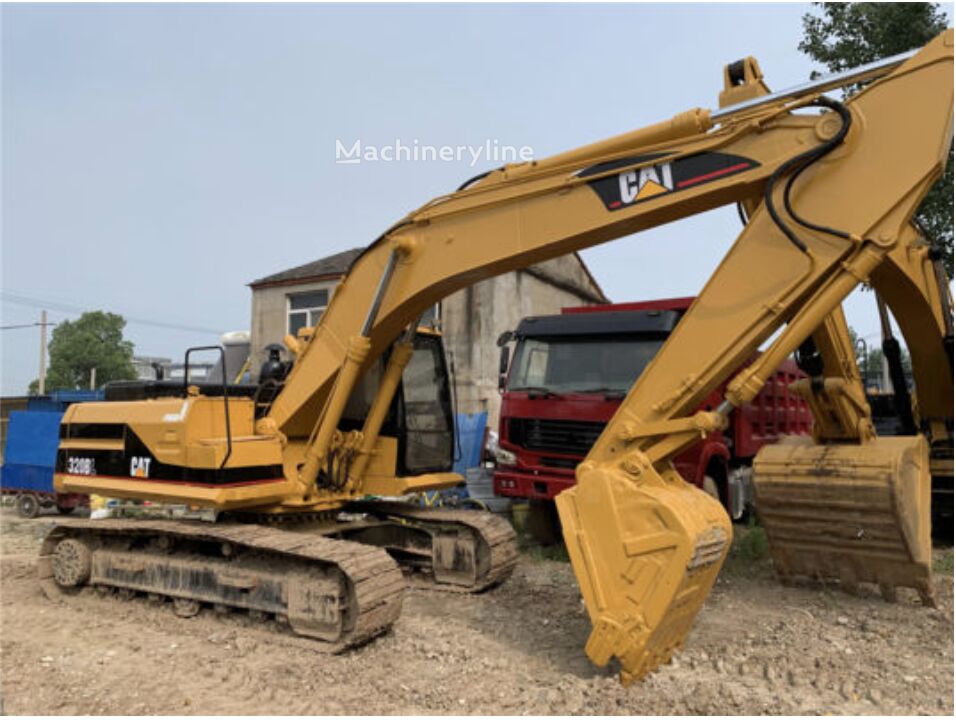 Caterpillar 320BL bager guseničar