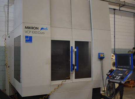 VPC 1000 DURO CNC Obračajni Centar MIKRON VCP 1000 Duro (2003) - ZAMENJENO VRETENO - Heidenhain iTNC 530 - HSK-A63 20.000 o/min