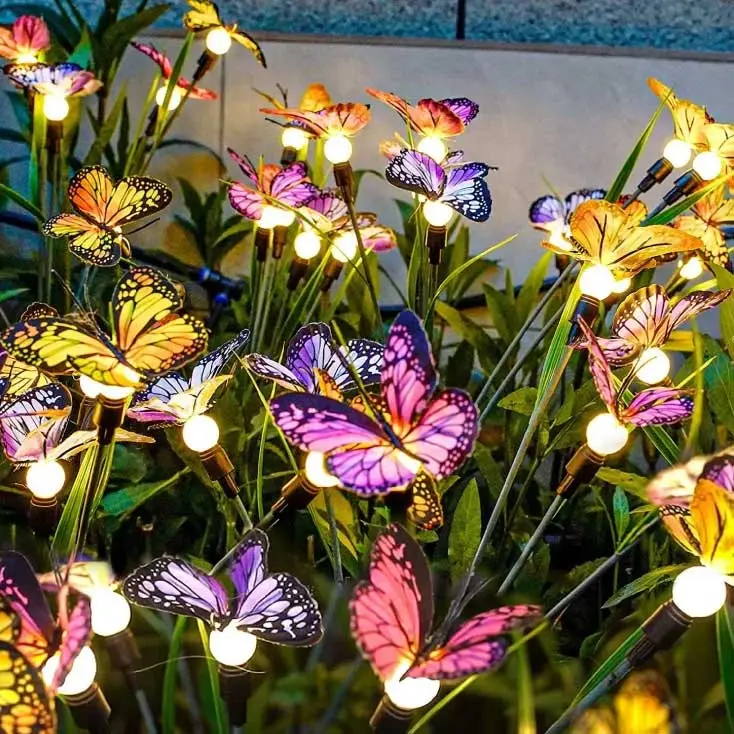 Solarne baštenske lampe sa leptirima koji se njišu na vetru 4 kom.