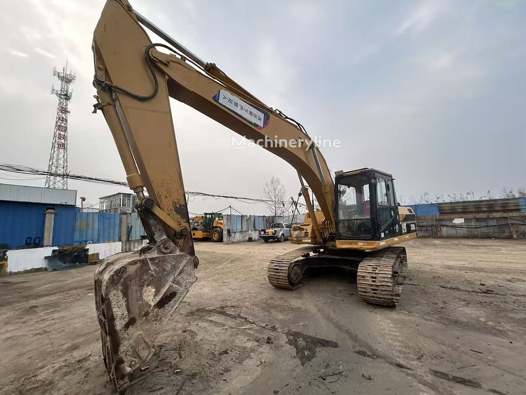 Caterpillar 320BL bager guseničar