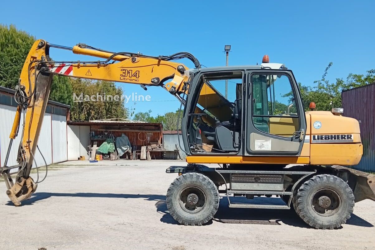 Liebherr A314 LITRONIC bager točkaš