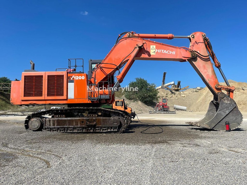 Hitachi EX1200-6 bager guseničar