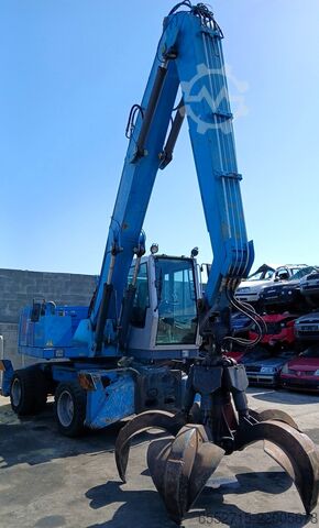 Točkaški utovarivač sa hvataljkom
Terex Fuchs MHL 320