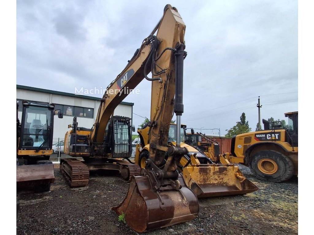 Caterpillar 320EL bager guseničar