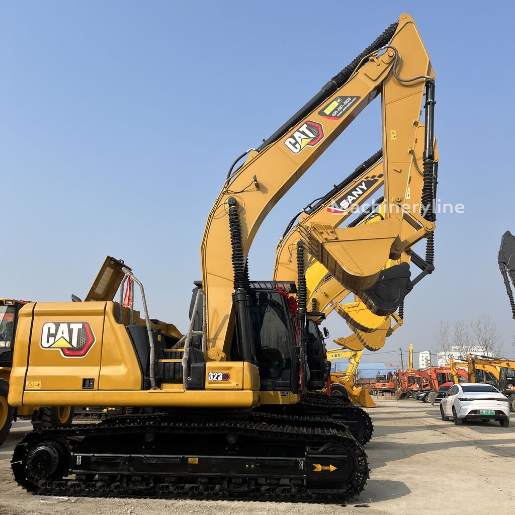 Caterpillar 323 bager guseničar