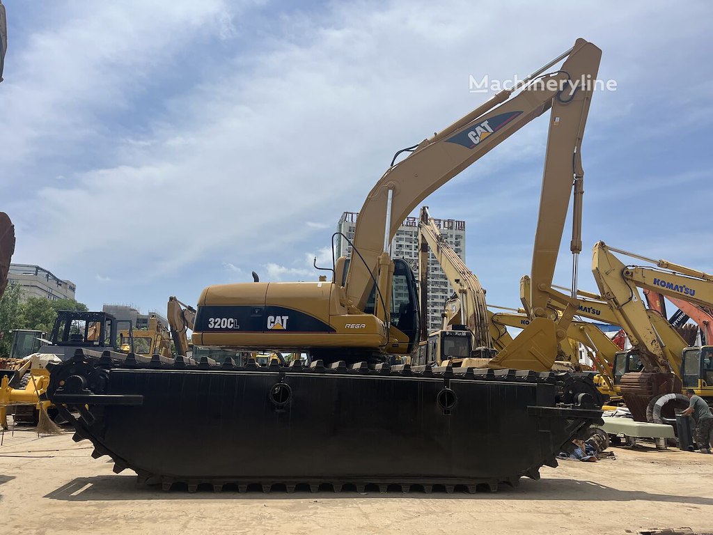 Caterpillar 320CL bager amfibija