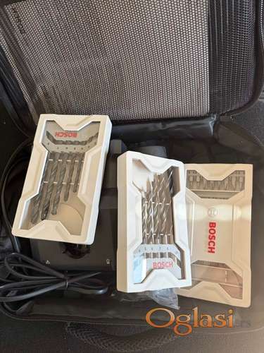 Bosch torba punjac 2 baterije 2 seta burgija i set nastavaka NOVO
