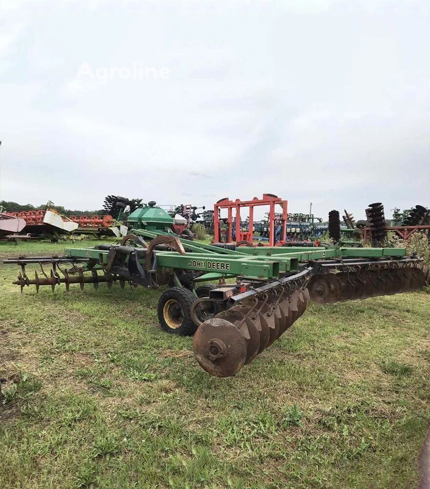 John Deere 510 tanjirača