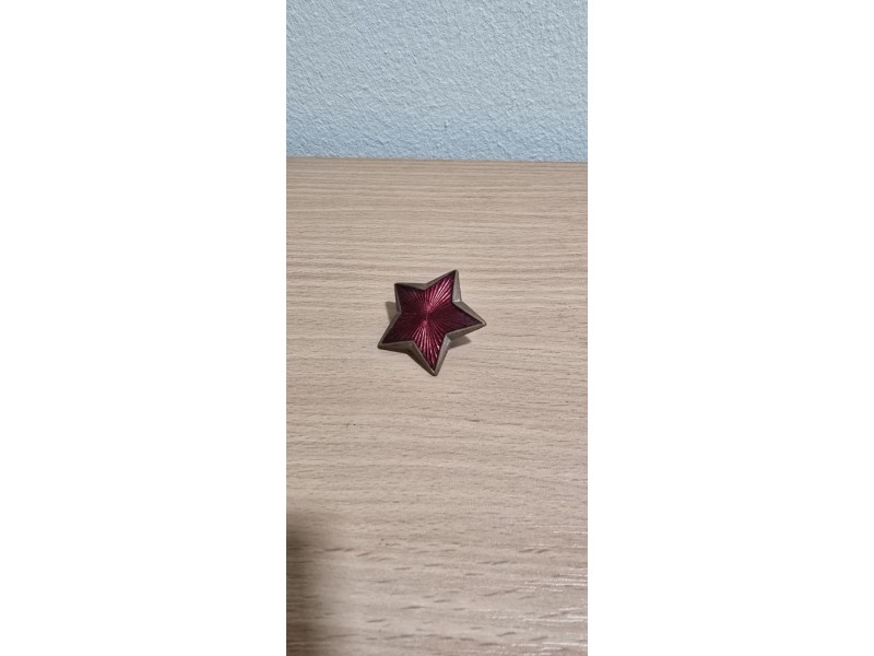 Jako stara emajlirana petokraka na rascepku