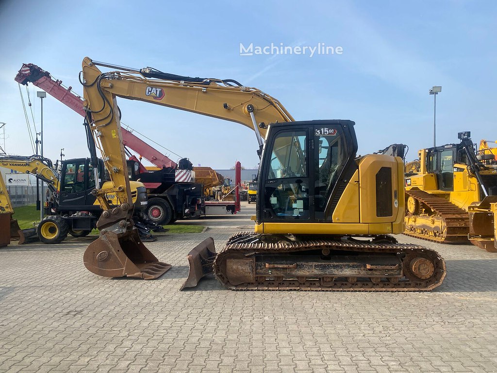 Caterpillar 315 GC . bager guseničar