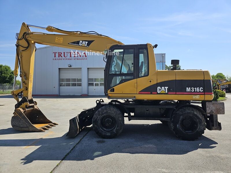 Caterpillar M316C bager točkaš