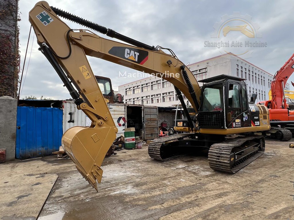 Caterpillar 323D bager guseničar