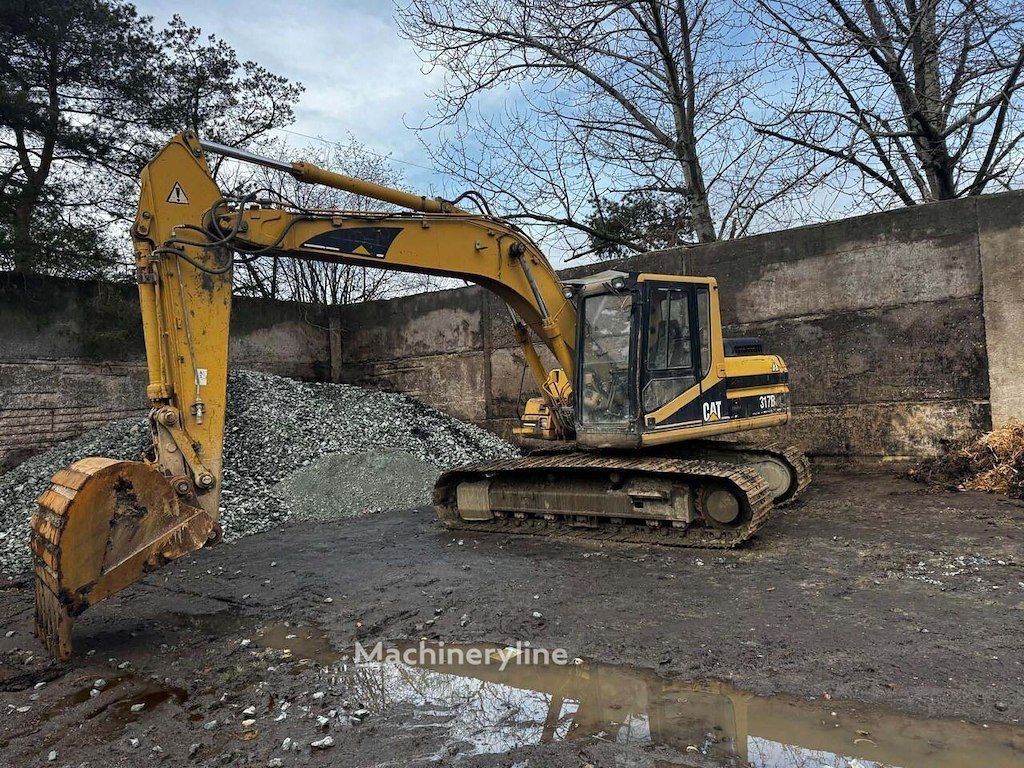 Caterpillar 317BL bager guseničar