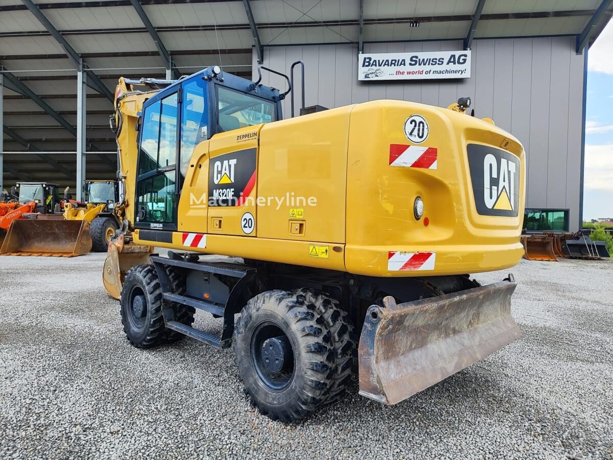 Caterpillar M320F bager točkaš