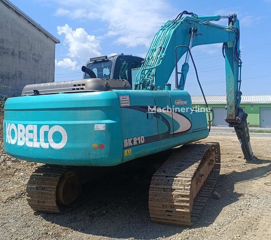 Kobelco SK210 bager guseničar