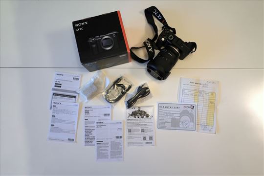 Sony A7C telo, kablovi, papiri, kutija, 600 okidan