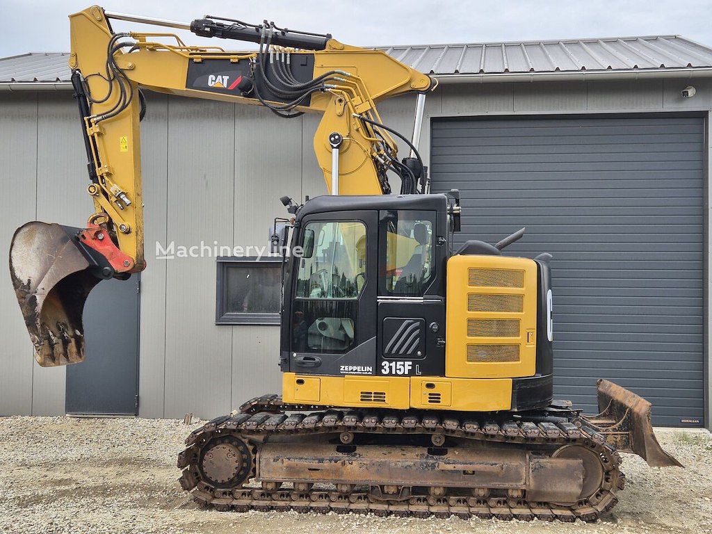 Caterpillar 315FL bager guseničar