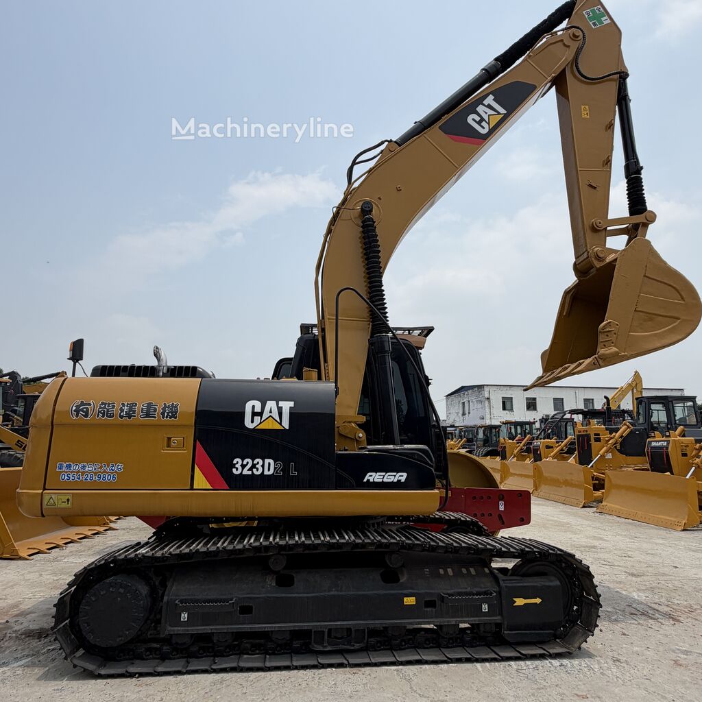 Caterpillar 323DL bager guseničar