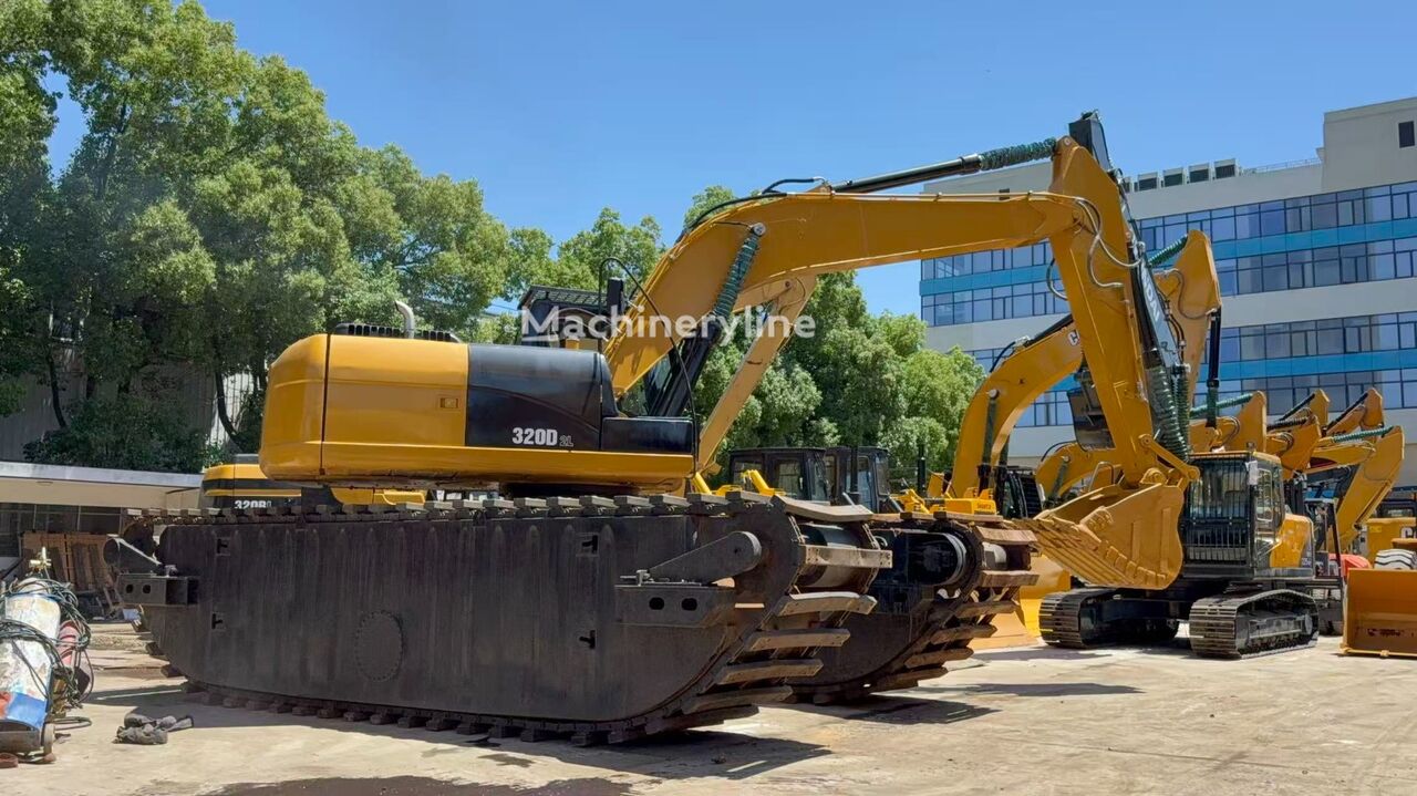 Caterpillar 320D bager amfibija